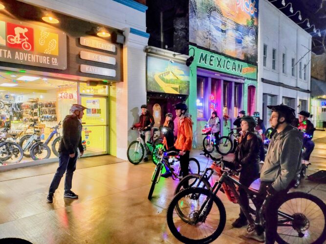 Light cycles: Neon-clad bikes gleam through the streets | News, Sports ...